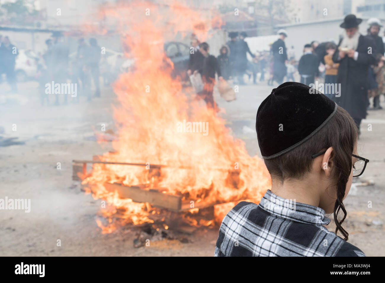 Jerusalem, Israel. 30th March, 2018. A kid wearing kippa in front of a ...
