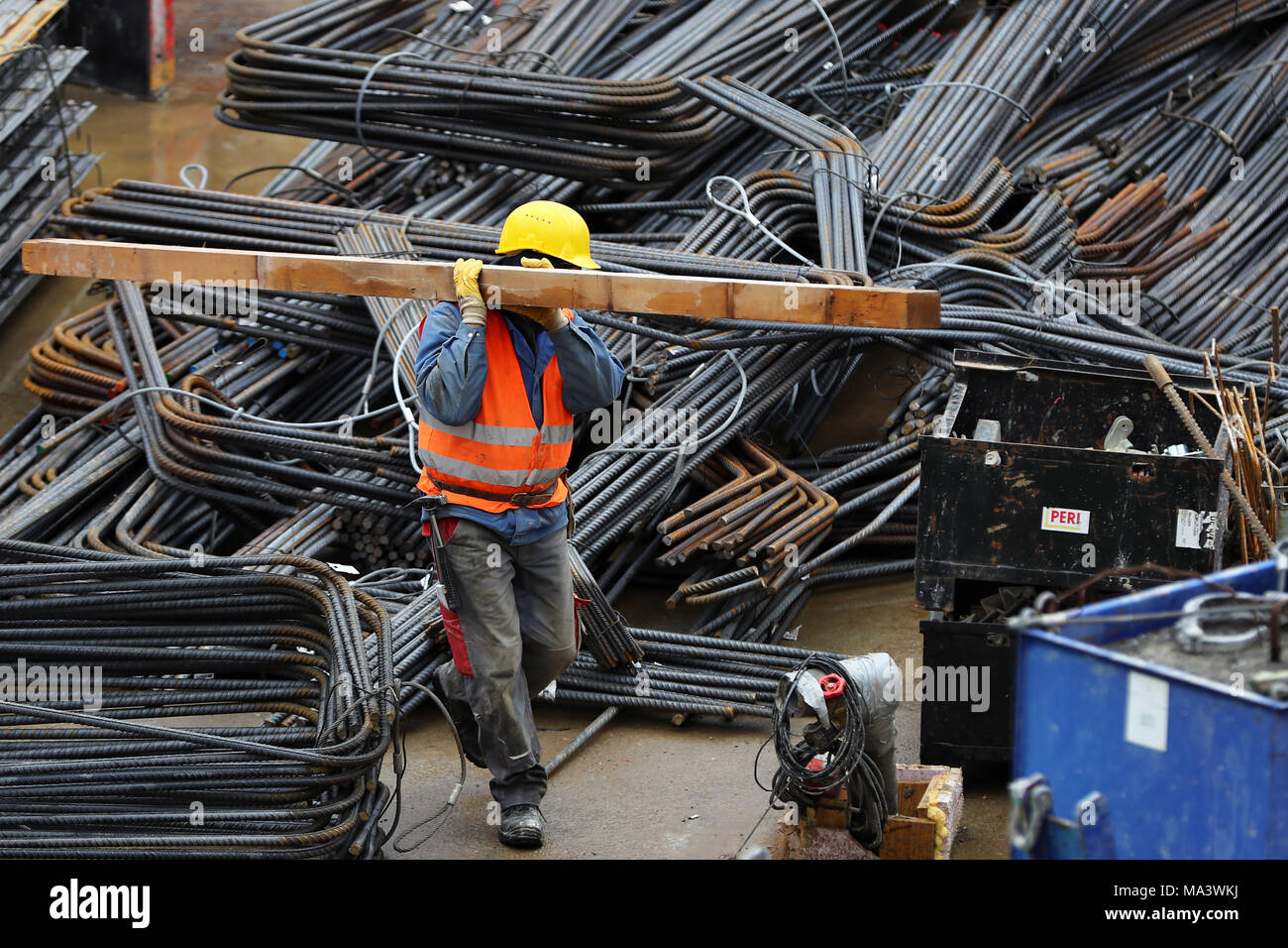 23 March 2018, Germany, Nuremberg: Construction workers are on site to ...