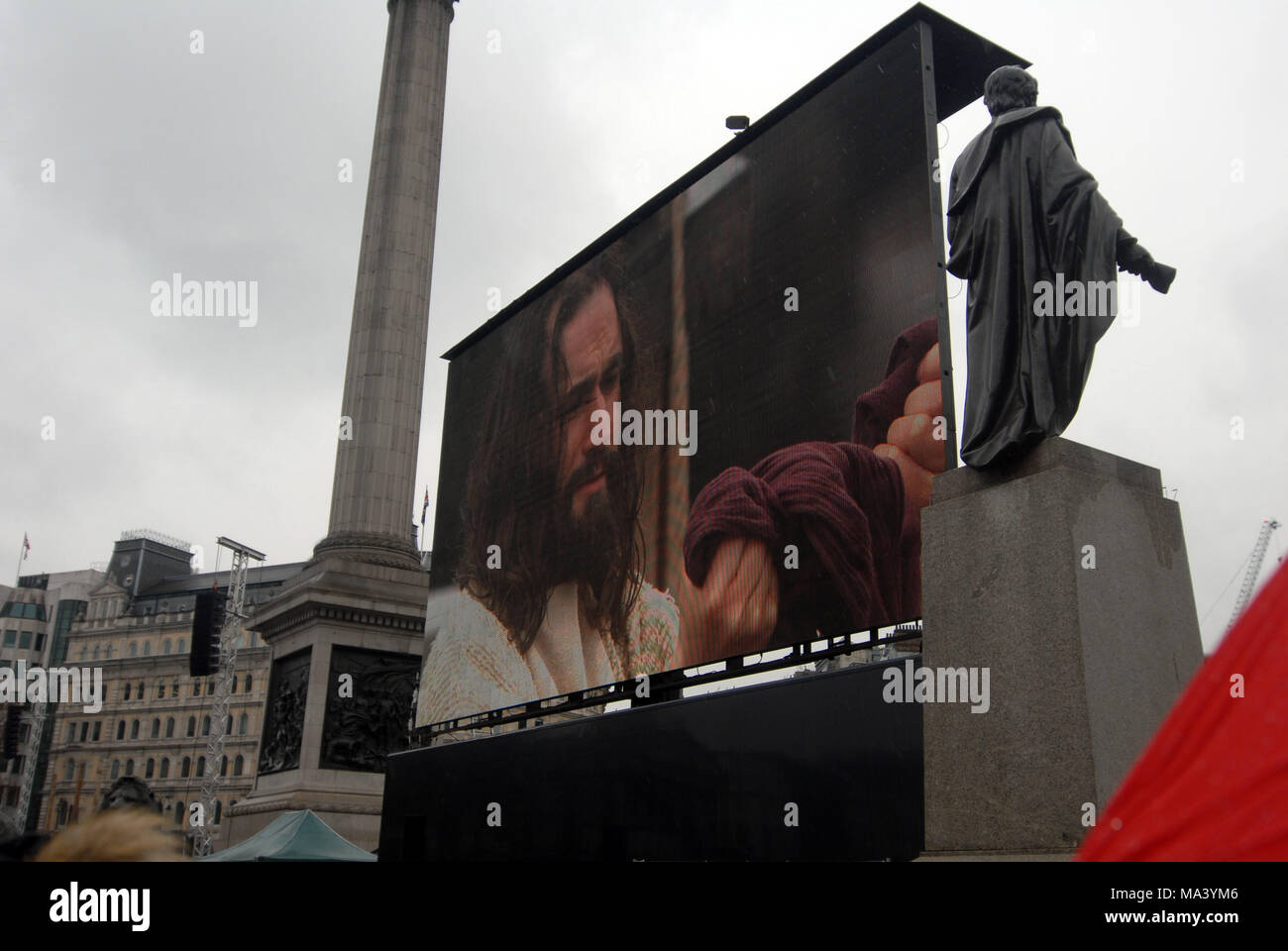 London, UK. 30th March, 2018. Crowds brave the rain in Trafalgar Square ...