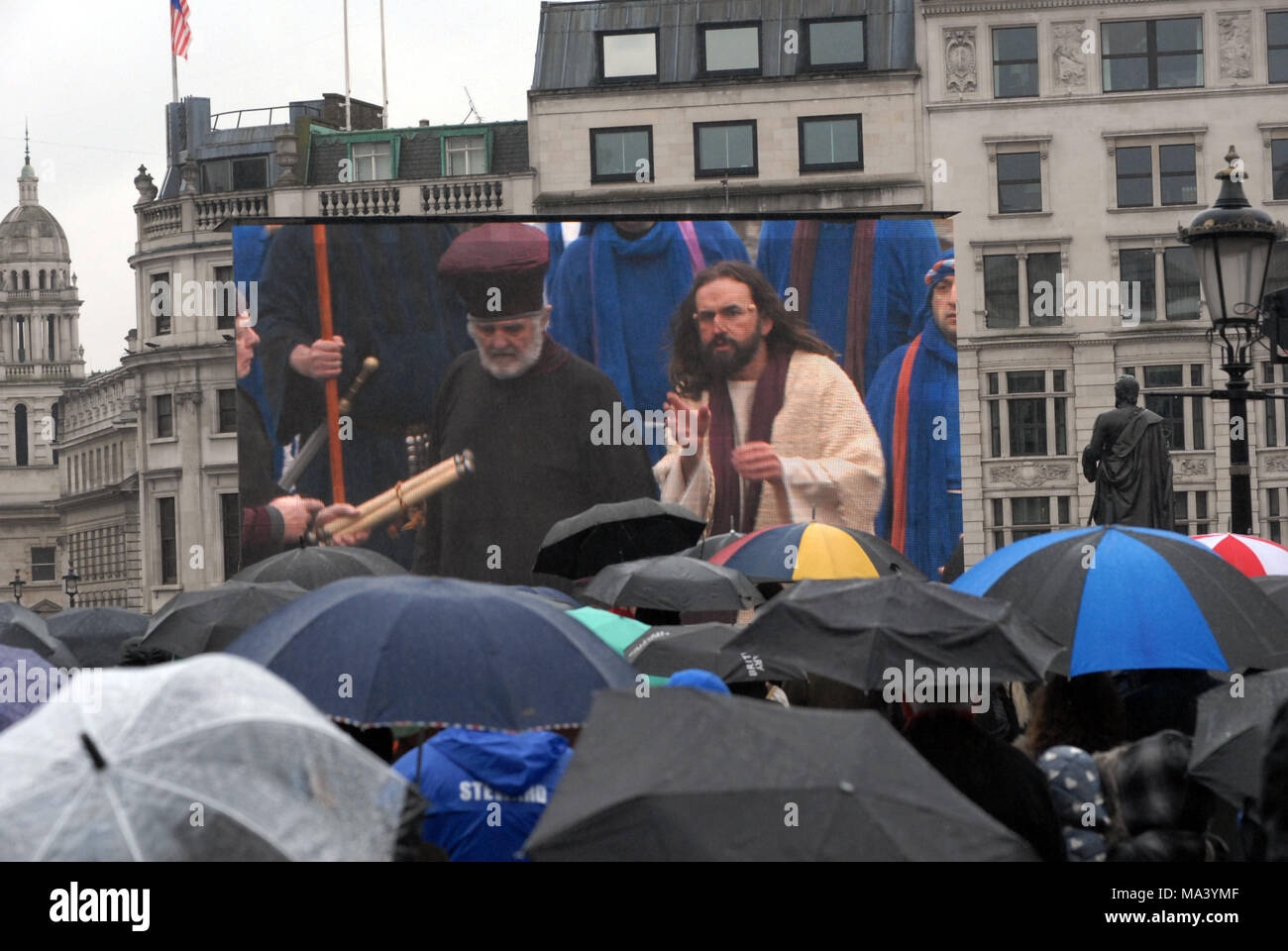London, UK. 30th March, 2018. Crowds brave the rain in Trafalgar Square ...