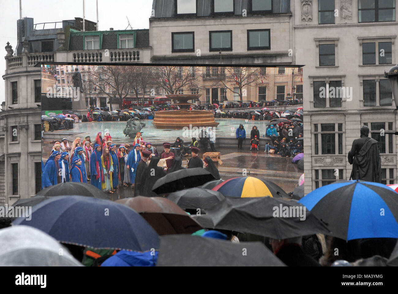 London, UK. 30th March, 2018. Crowds brave the rain in Trafalgar Square ...