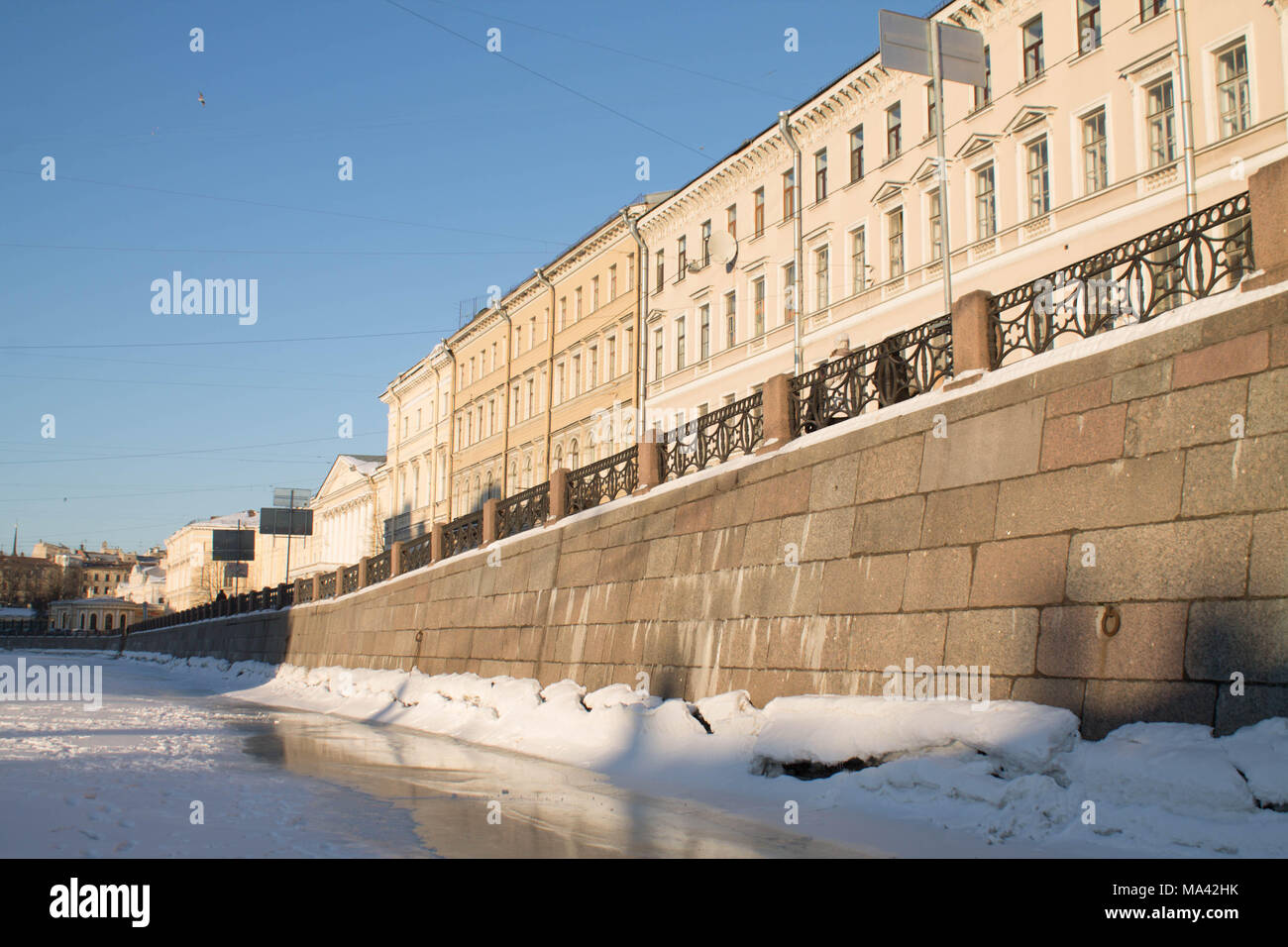 granite embankment of the Fontanka river in St. Petersburg, Russia ...
