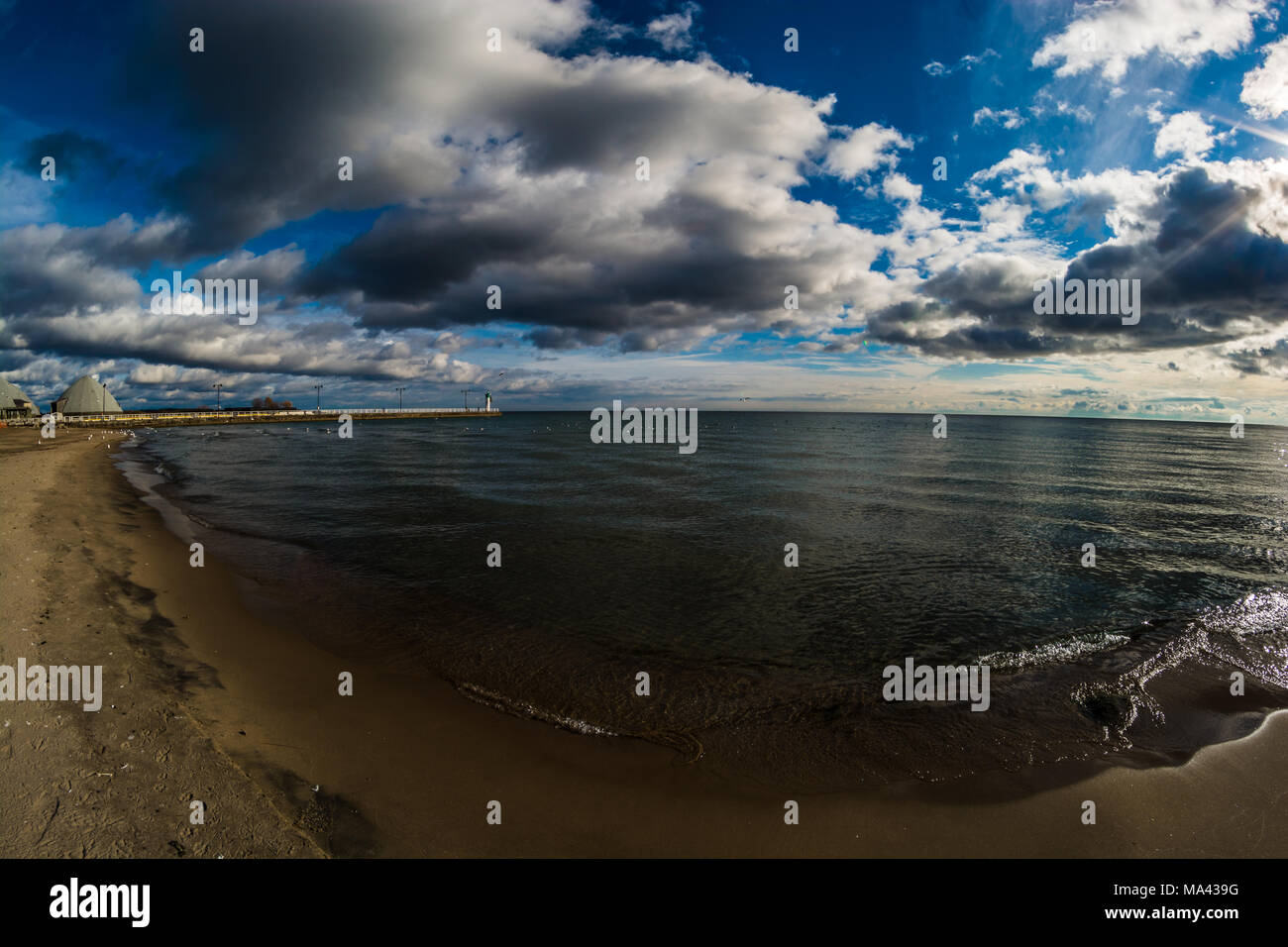 Landscape Scene of Pier, lake and beach on early spring on a beautiful ...