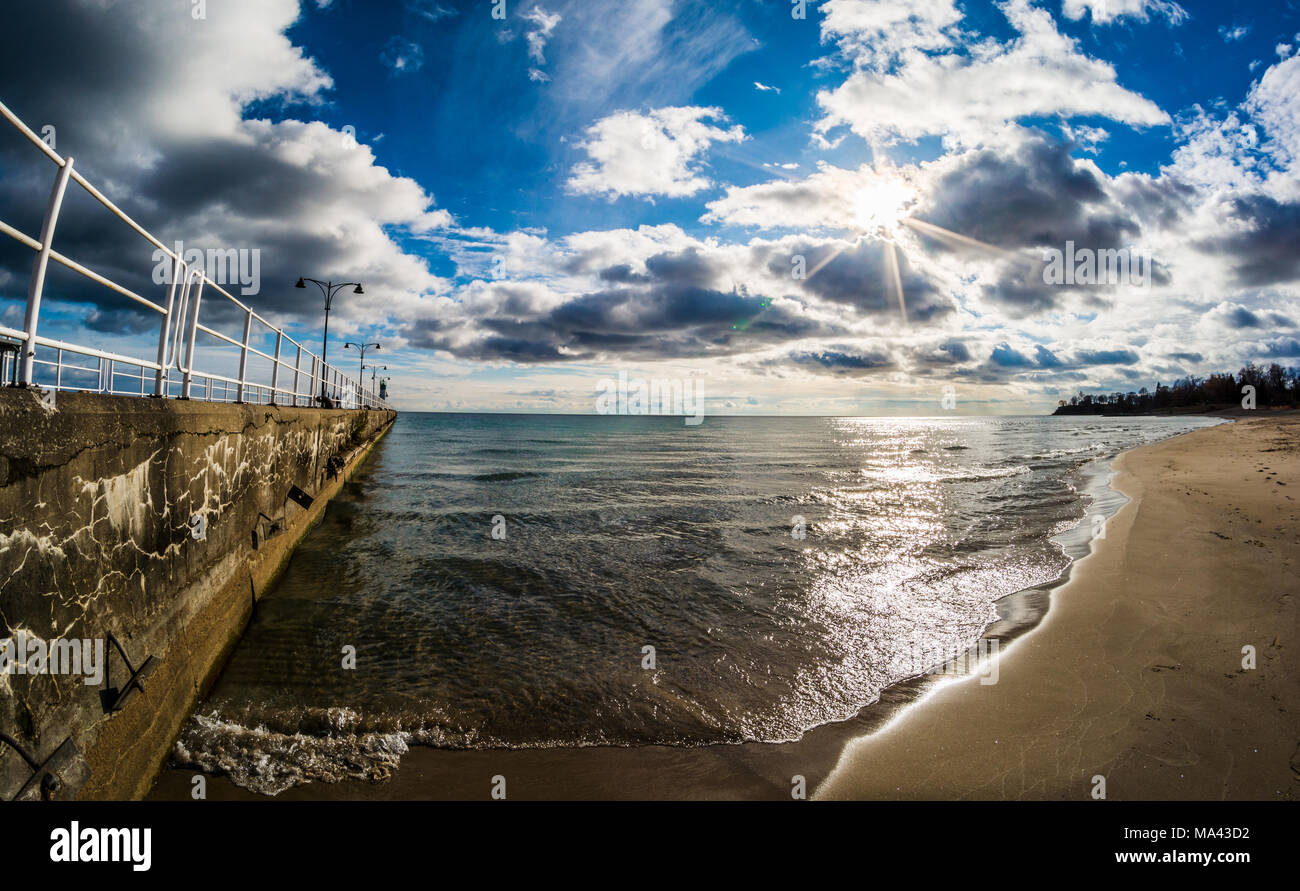 Landscape Scene of Pier, lake and beach on early spring on a beautiful ...