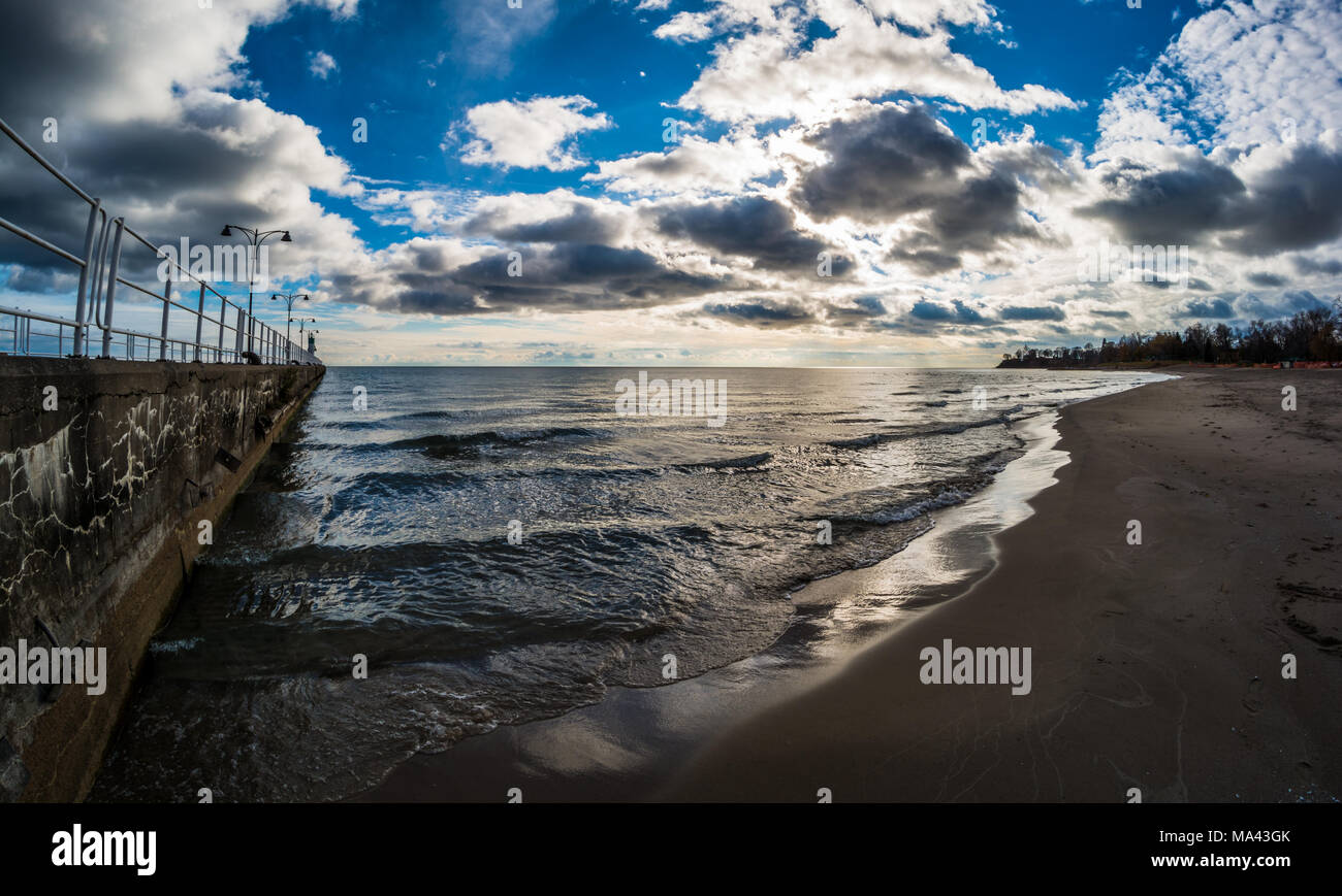 Landscape Scene of Pier, lake and beach on early spring on a beautiful ...