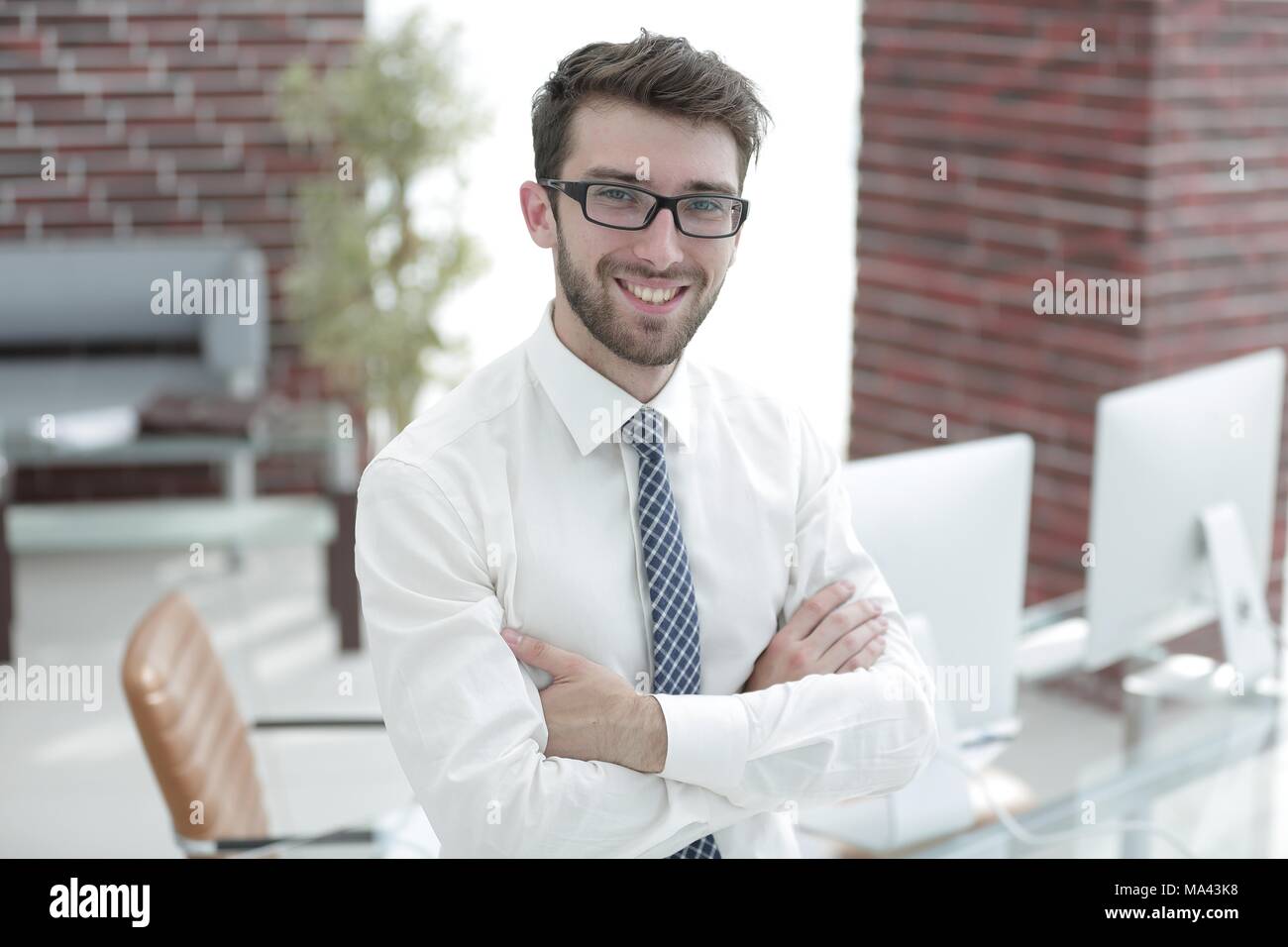 portrait of a successful employee in your office Stock Photo - Alamy