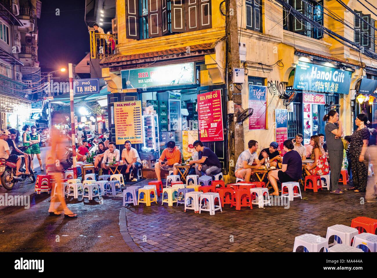 Tourists outside bars in the Old Town of Hanoi, Vietnam Stock Photo - Alamy