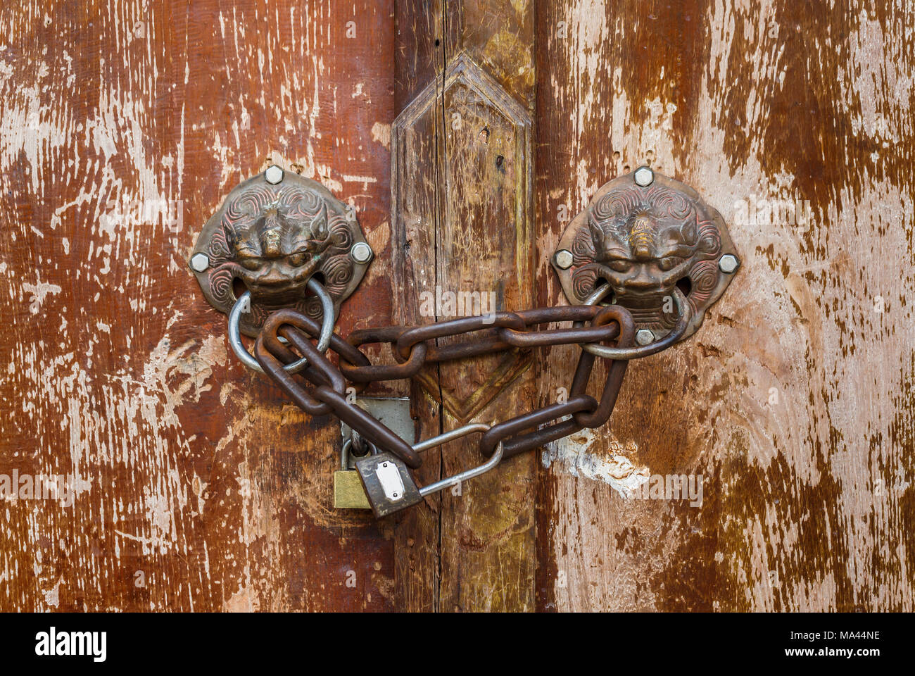 Lion Head Door Knocker, Ancient Knocker with chain and lock Stock Photo ...