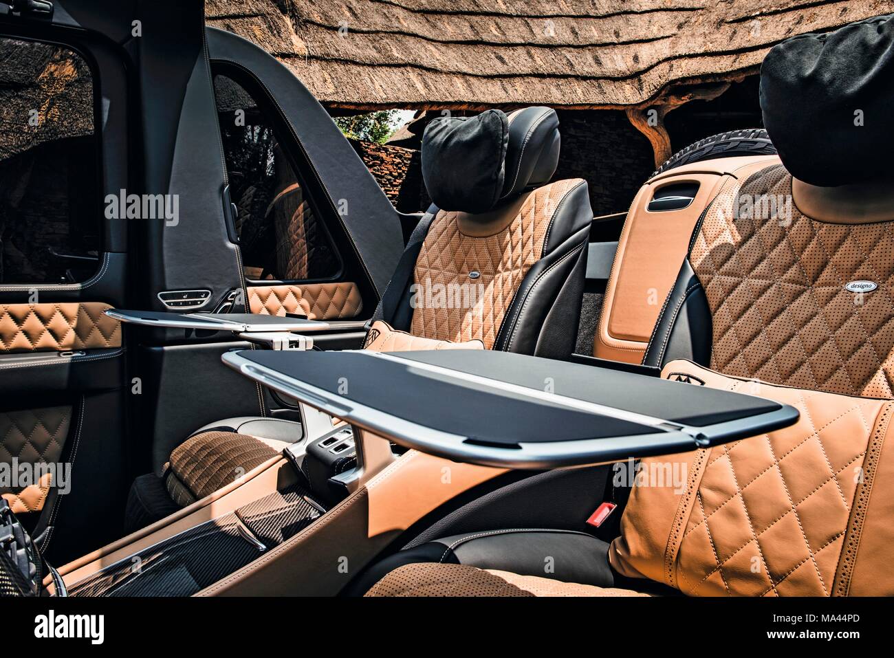 Backseats with tables in the Mercedes-Maybach G 650, an SUV by Mercedes ...