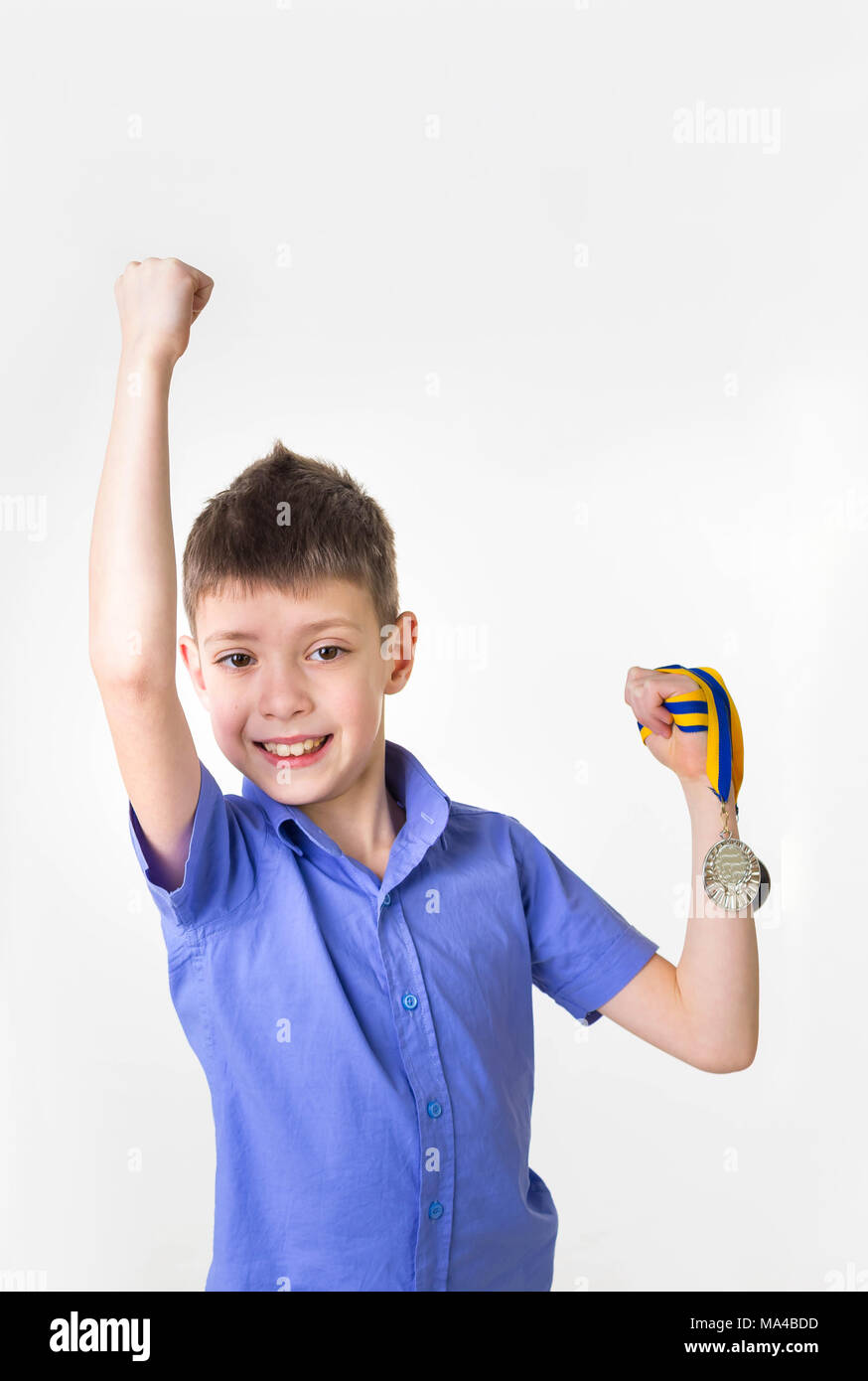 Happy expressive child i with medal isolated on white Stock Photo - Alamy