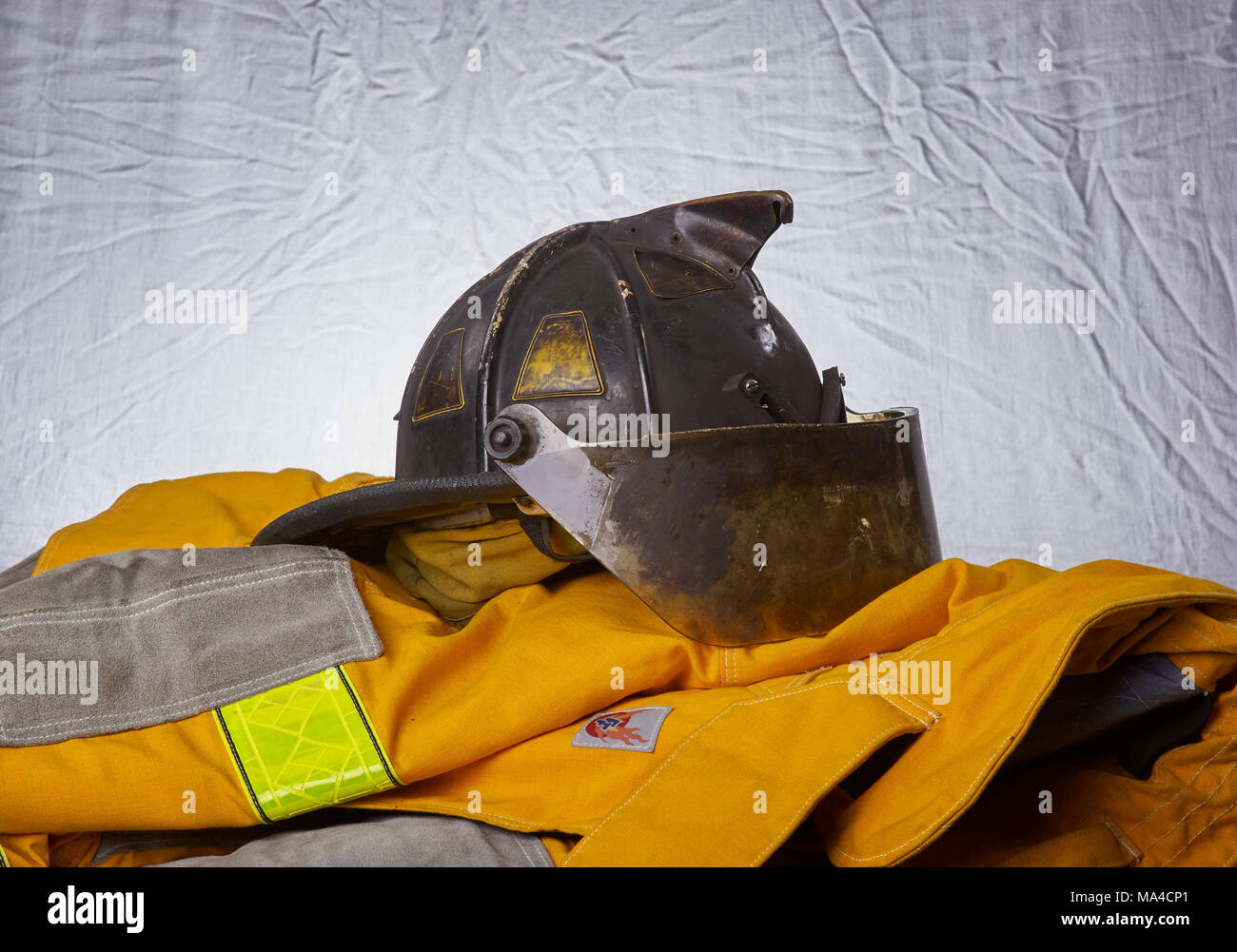 Jacket, Helmet, Pants worn by firemen during fire fighting emergencies ...