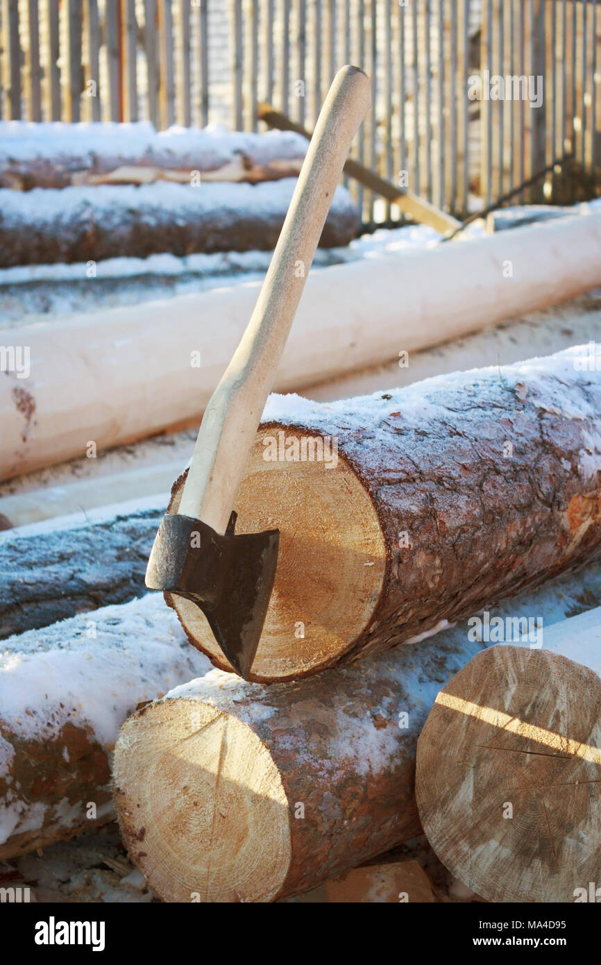 The axe at the construction site of the house Stock Photo - Alamy