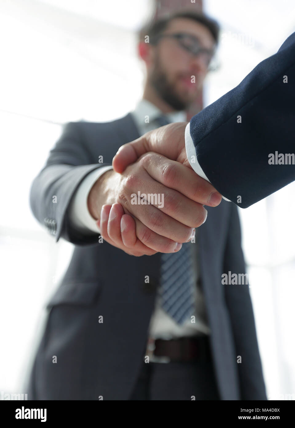 business leader shaking hands with partner.vertical photo Stock Photo ...