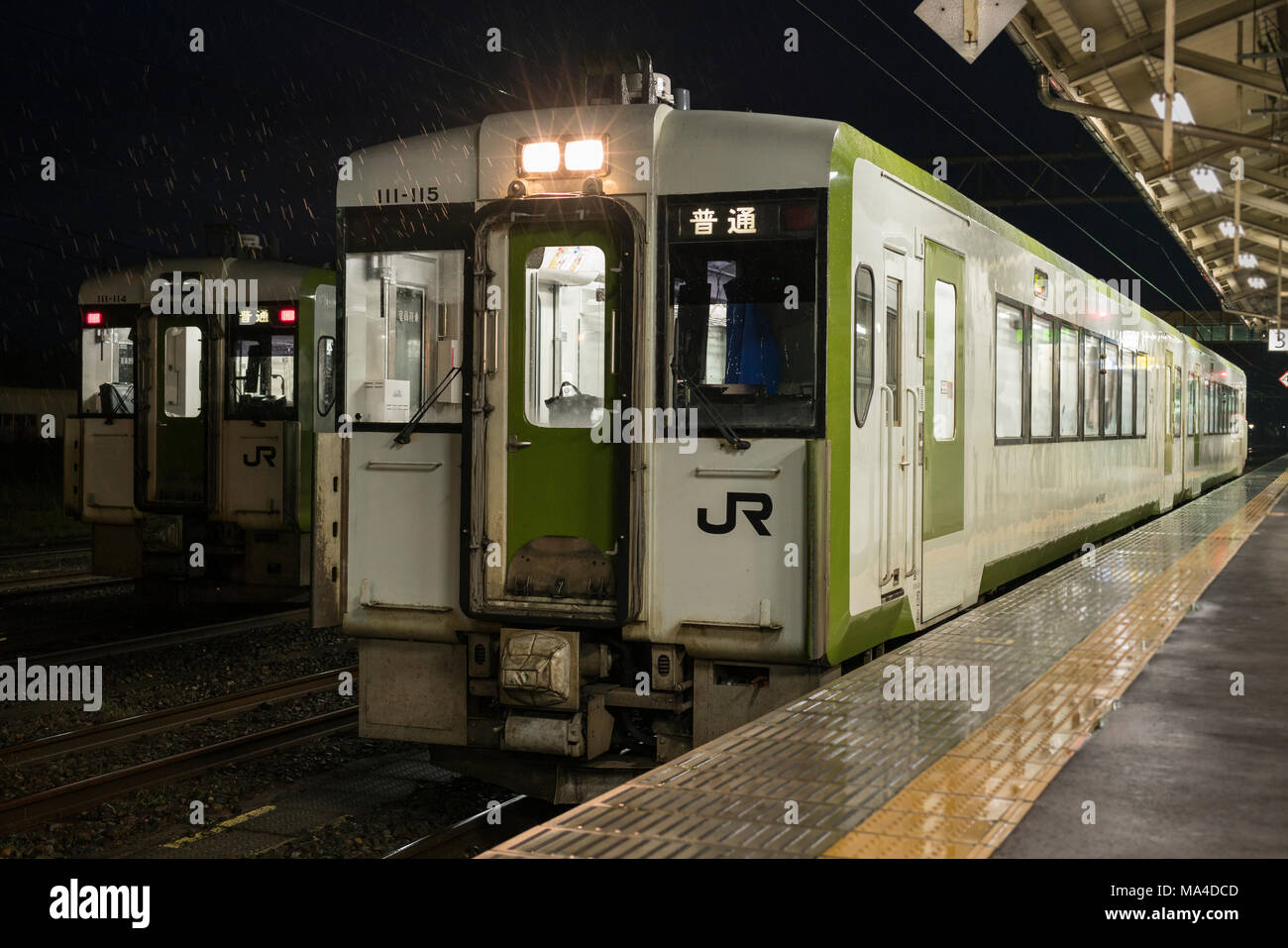 Japan Rail (JR East) KiHa 100 Series trains in the rain at Odate ...