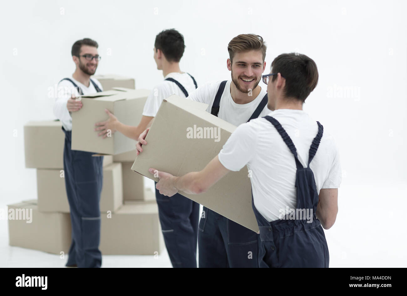Men delivering box isolated on white Stock Photo - Alamy