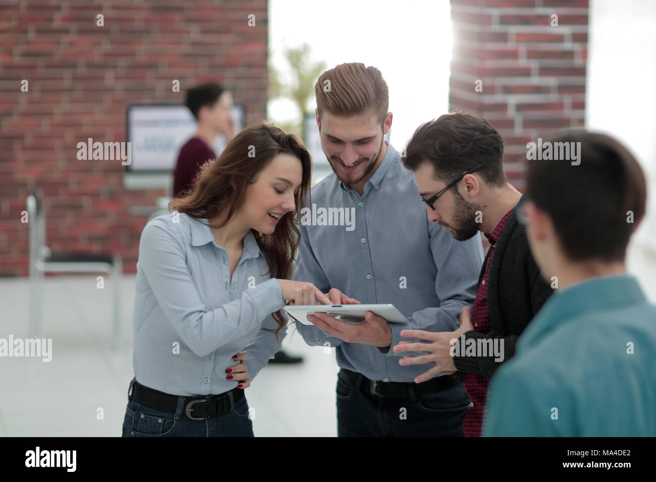 Group of business people who standing and discuss Stock Photo - Alamy