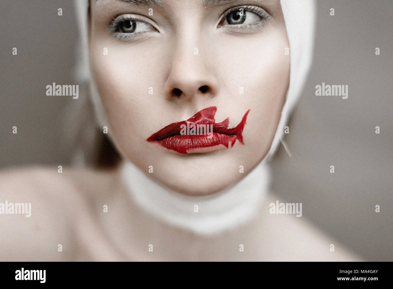 Girl with bloody fingers and shark lips. Halloween horror concept ...