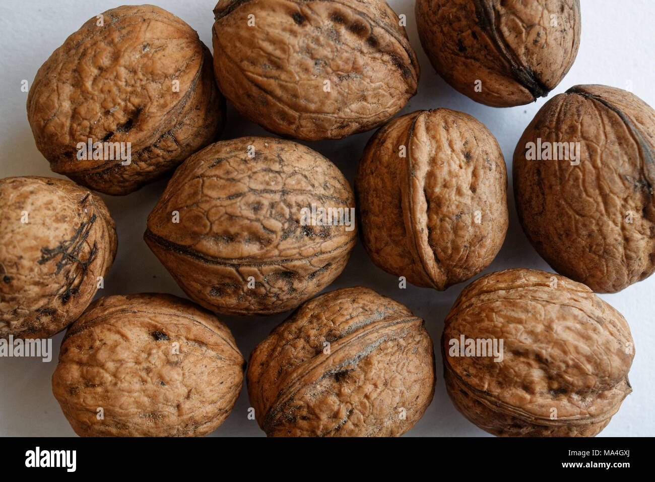Handful of walnuts hi-res stock photography and images - Alamy