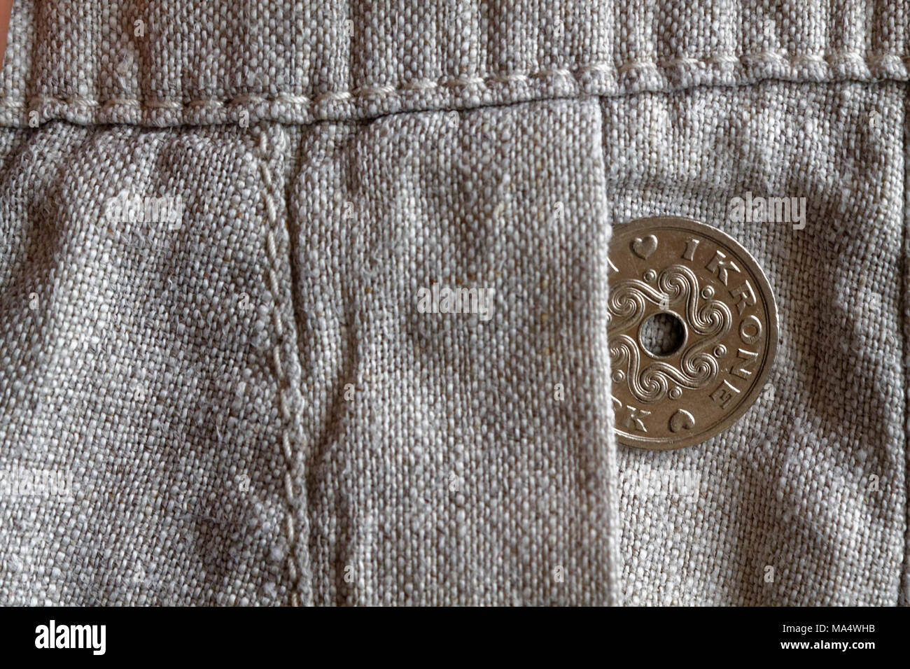 Denmark coin denomination is one krone (crown) in the pocket of old ...