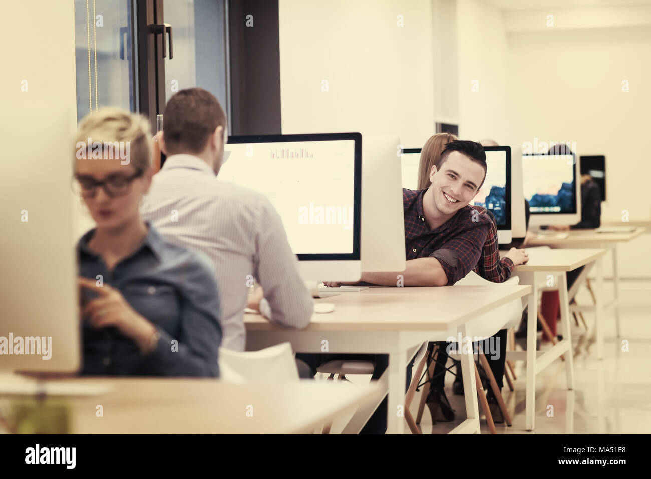 startup business, software developer working on desktop computer at modern office Stock Photo ...