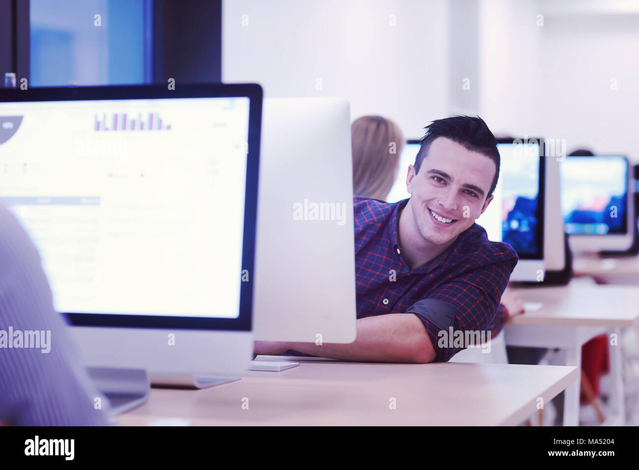 startup business, software developer working on desktop computer at modern office Stock Photo ...