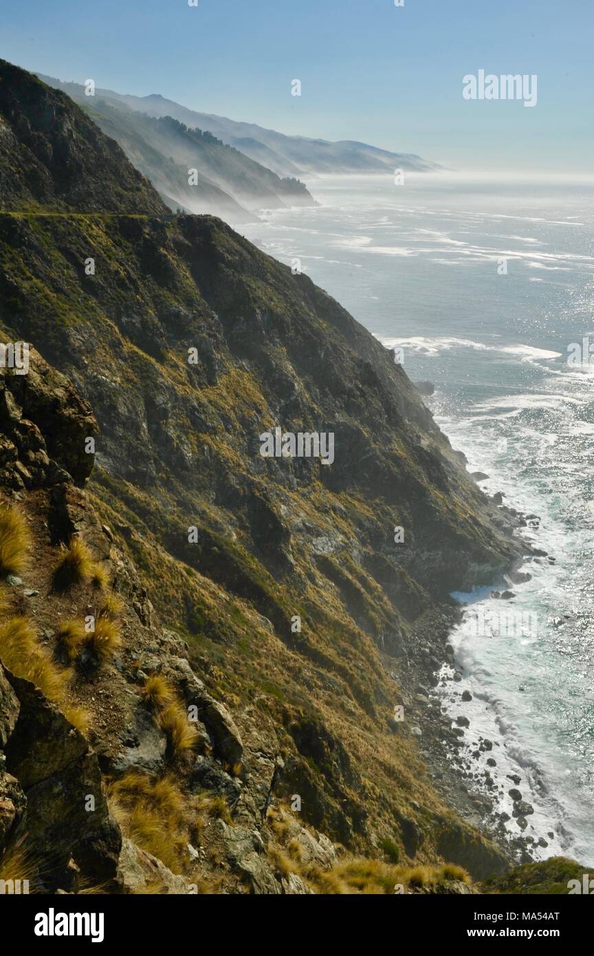 Rugged coastline landscape with Pacific Ocean, waves and rocky cliffs ...