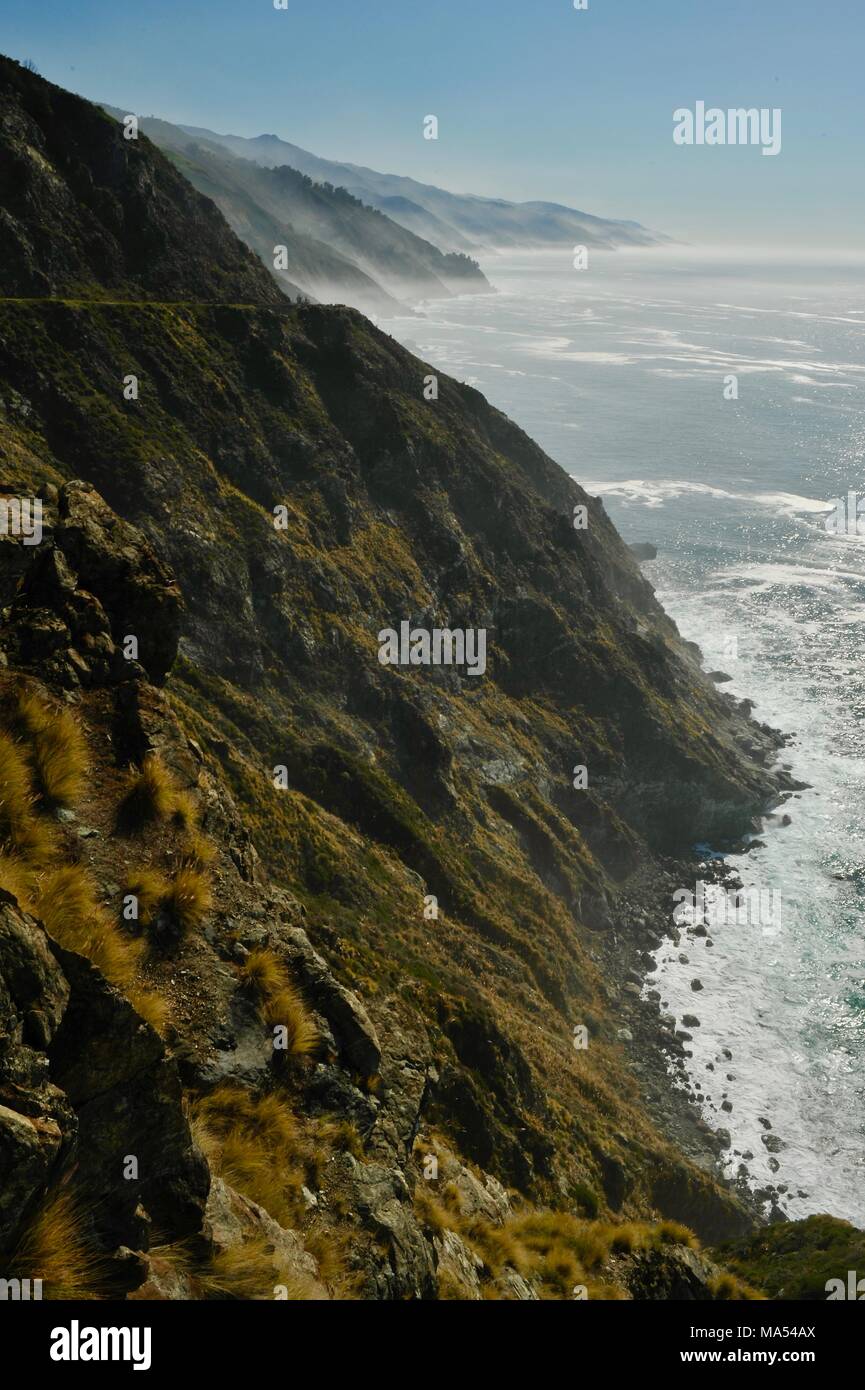 Rugged coastline landscape with Pacific Ocean, waves and rocky cliffs ...