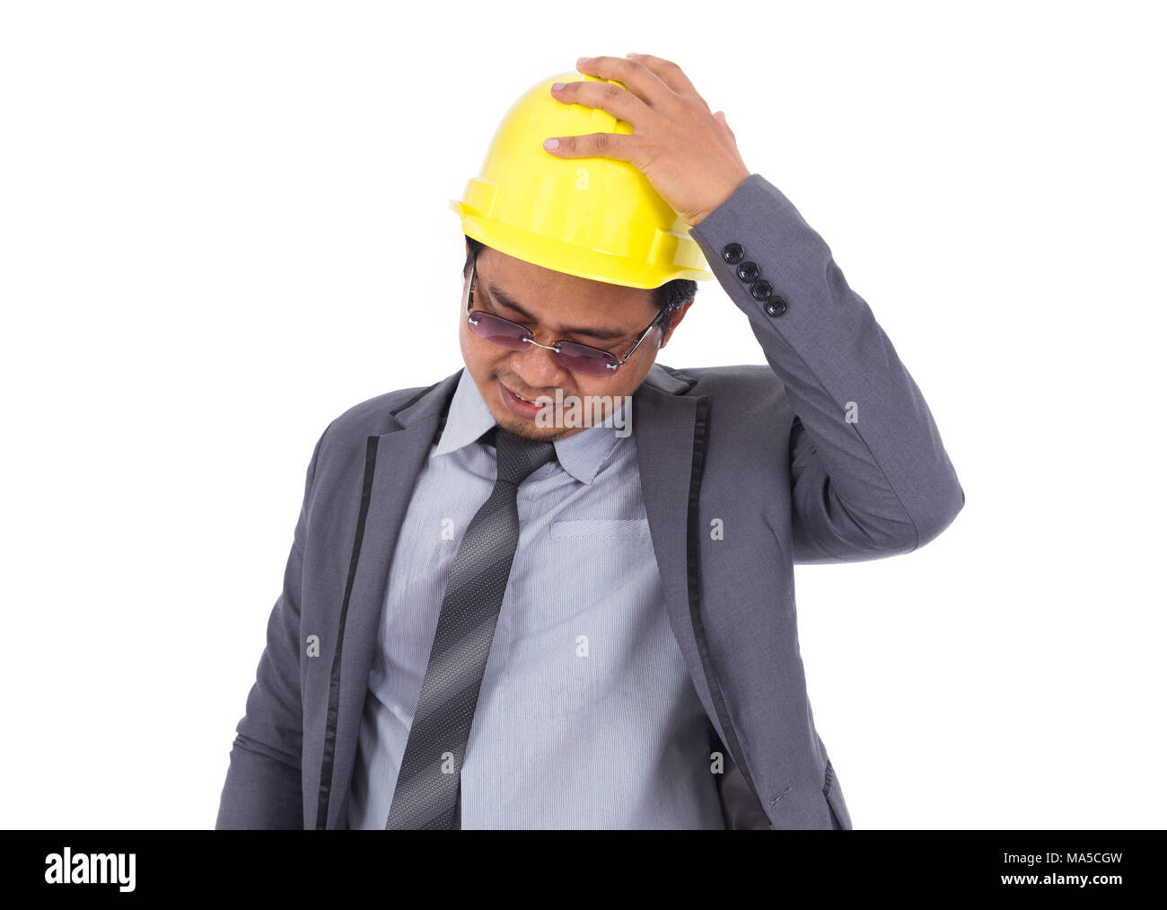 engineer in suit with headache and problems isolated on a white ...