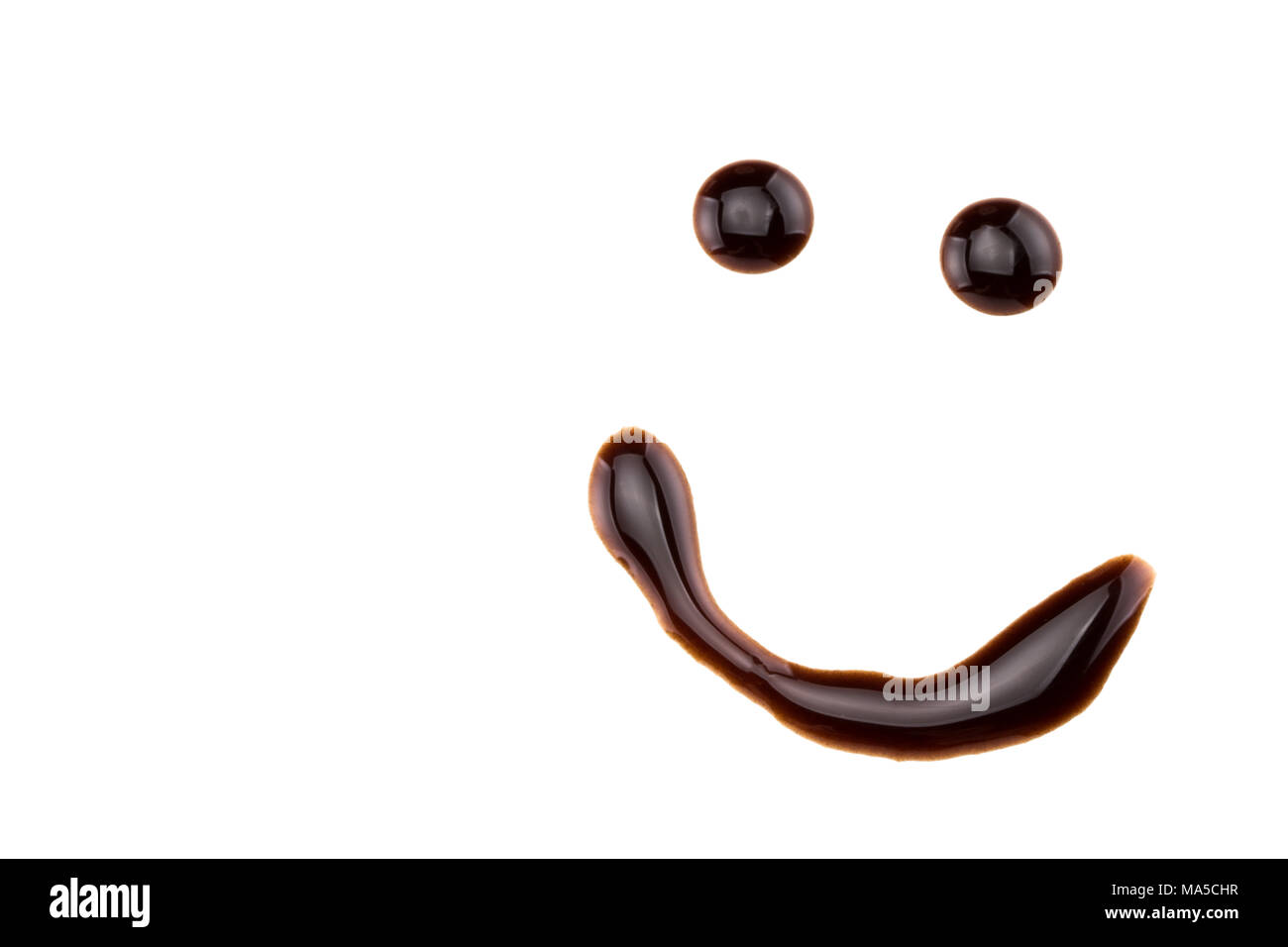 smile made from chocolate syrup, isolated on white Stock Photo - Alamy