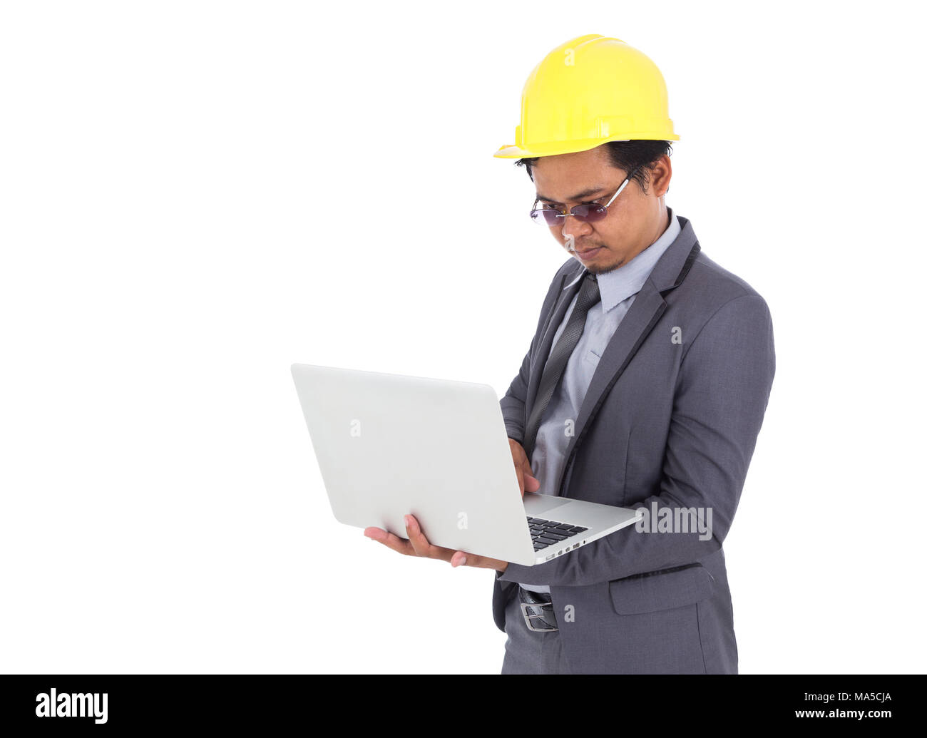 engineer using laptop isolated on a white background Stock Photo - Alamy