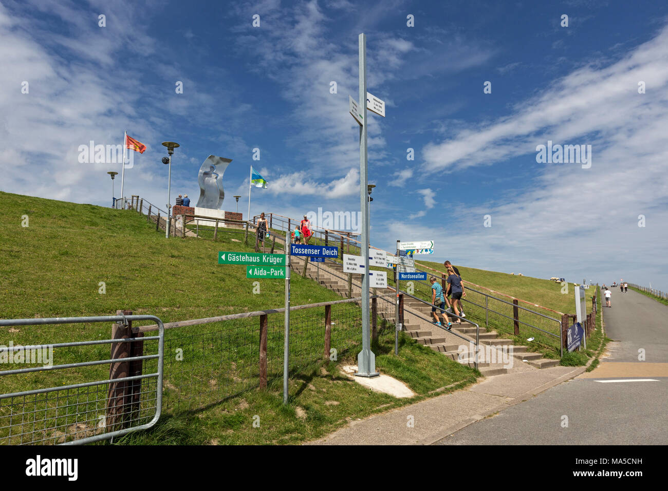 dyke crossing to Friesenstrand, stainless steel sculpture 'Der blanke ...