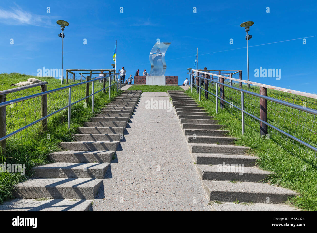 dyke crossing to Friesenstrand, stainless steel sculpture 'Der blanke ...