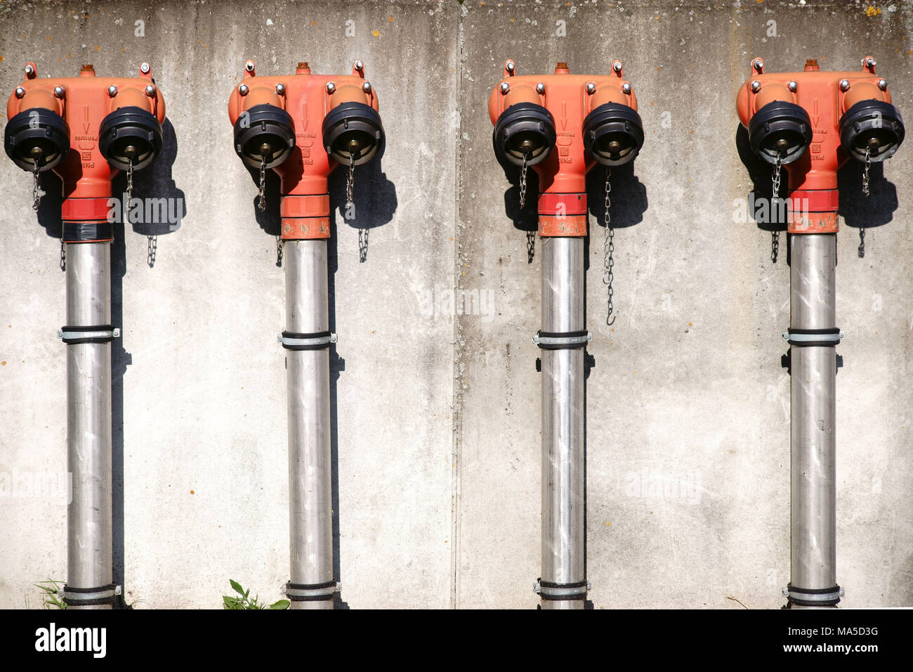 sorted side by side extinguishing water point ona public building Stock ...