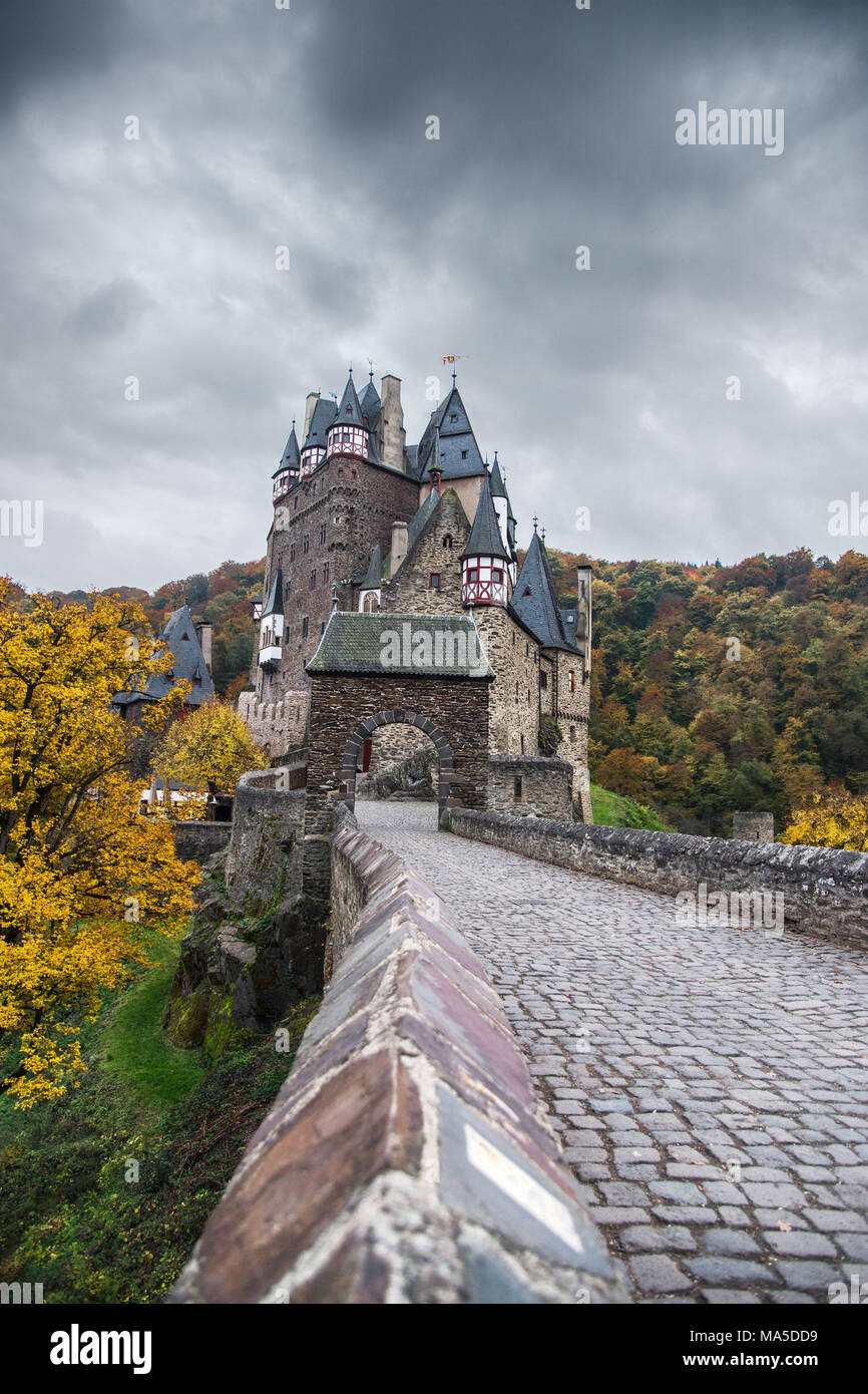 The autumnal castle Eltz in cloudy sky Stock Photo - Alamy
