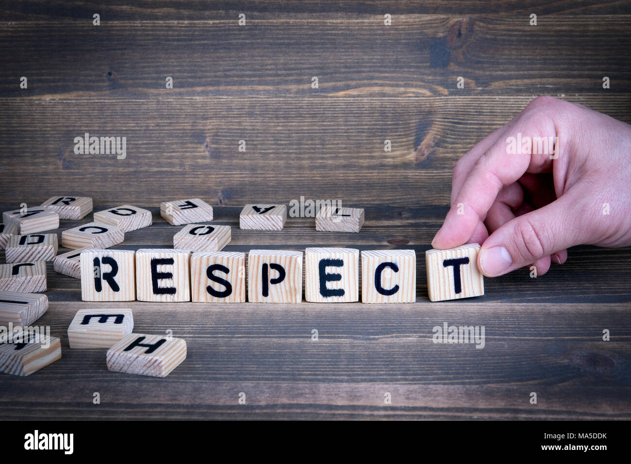 Respect. Wooden letters on the office desk, informative and ...