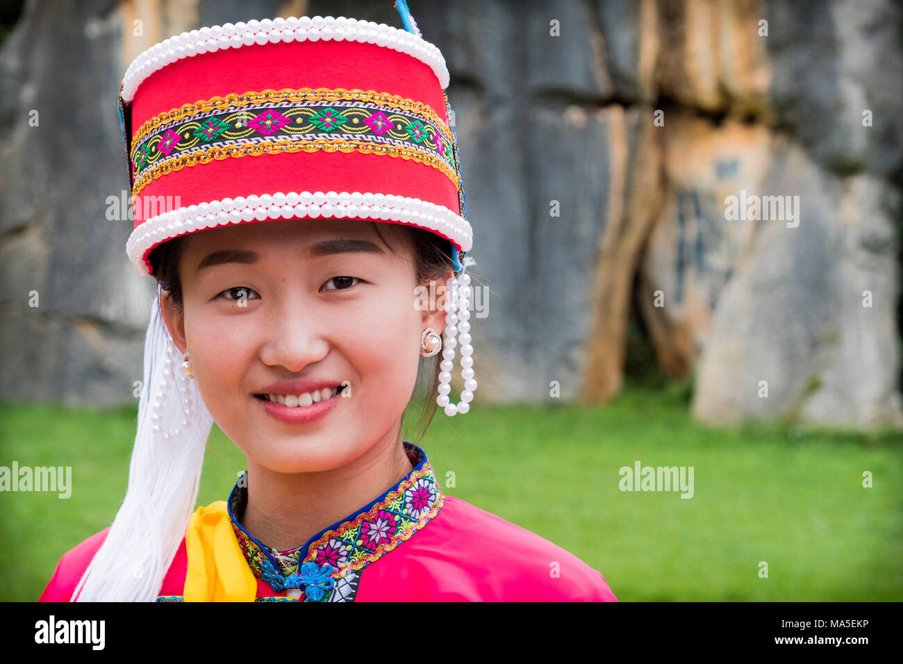 Sani minority girl with traditional dress at Stone Forest or Shilin ...