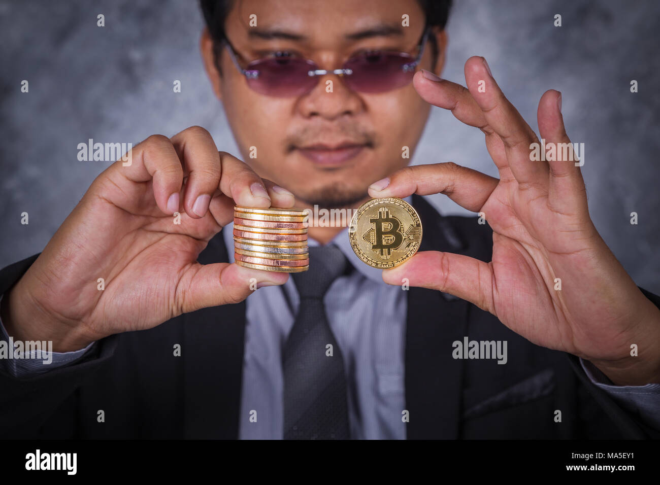 Man in pile of money hi-res stock photography and images - Alamy