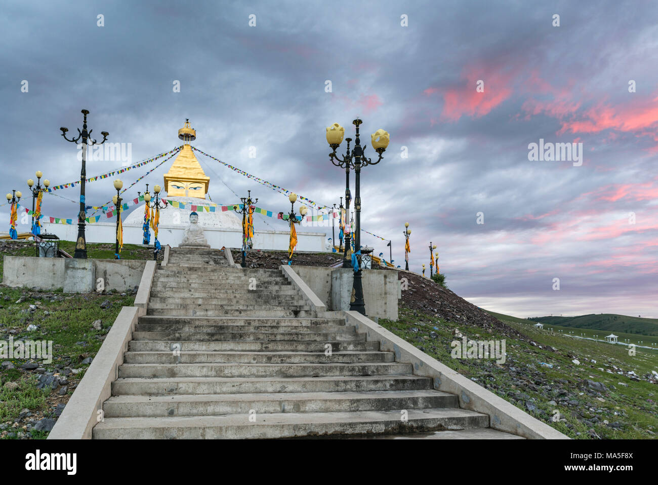 Stairs to the Ovoo above Amarbayasgalant Monastery at sunset. Mount ...