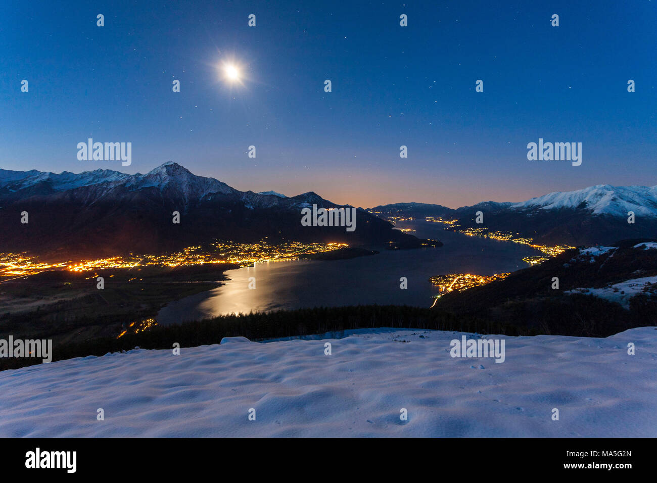 Lombardy, Italy, the moonlight reflect in Como lake by night, province ...