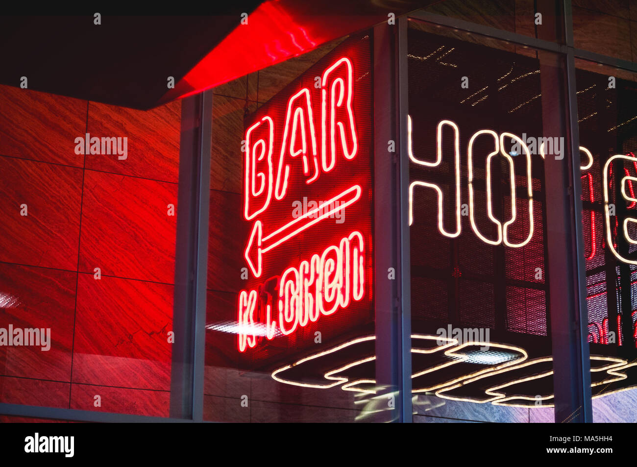 Red Neon Sign in Rotterdam Stock Photo - Alamy