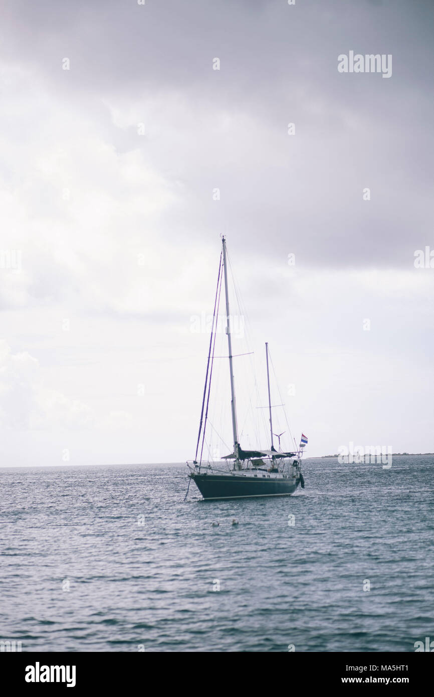 sailboat on the middle of the ocean Stock Photo - Alamy