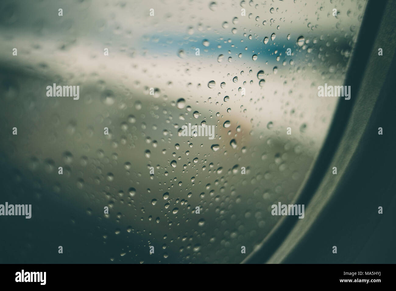 view from airplane window with rain drops Stock Photo - Alamy