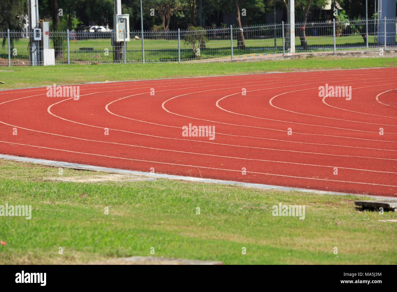 Green running track curve hi-res stock photography and images - Alamy