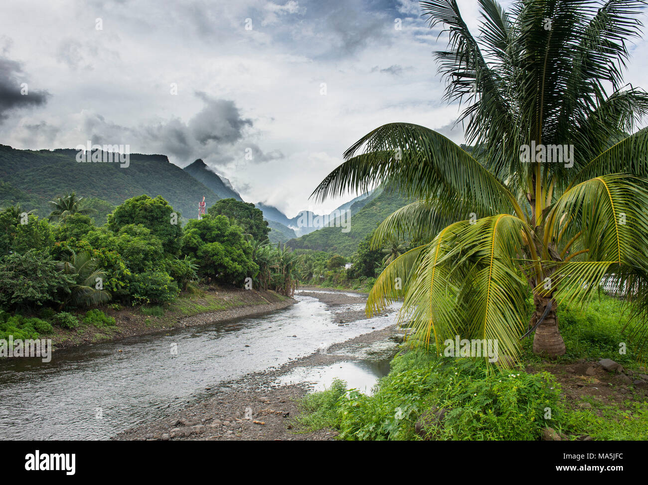 Paea river with dramatic mountains in the background, Tahiti, French ...