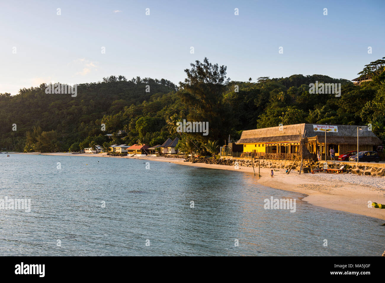 Matira Point beach at sunset, Bora Bora, French Polynesia Stock Photo ...