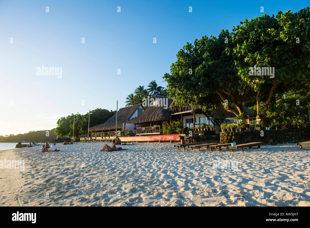 Matira Point beach at sunset, Bora Bora, French Polynesia Stock Photo ...