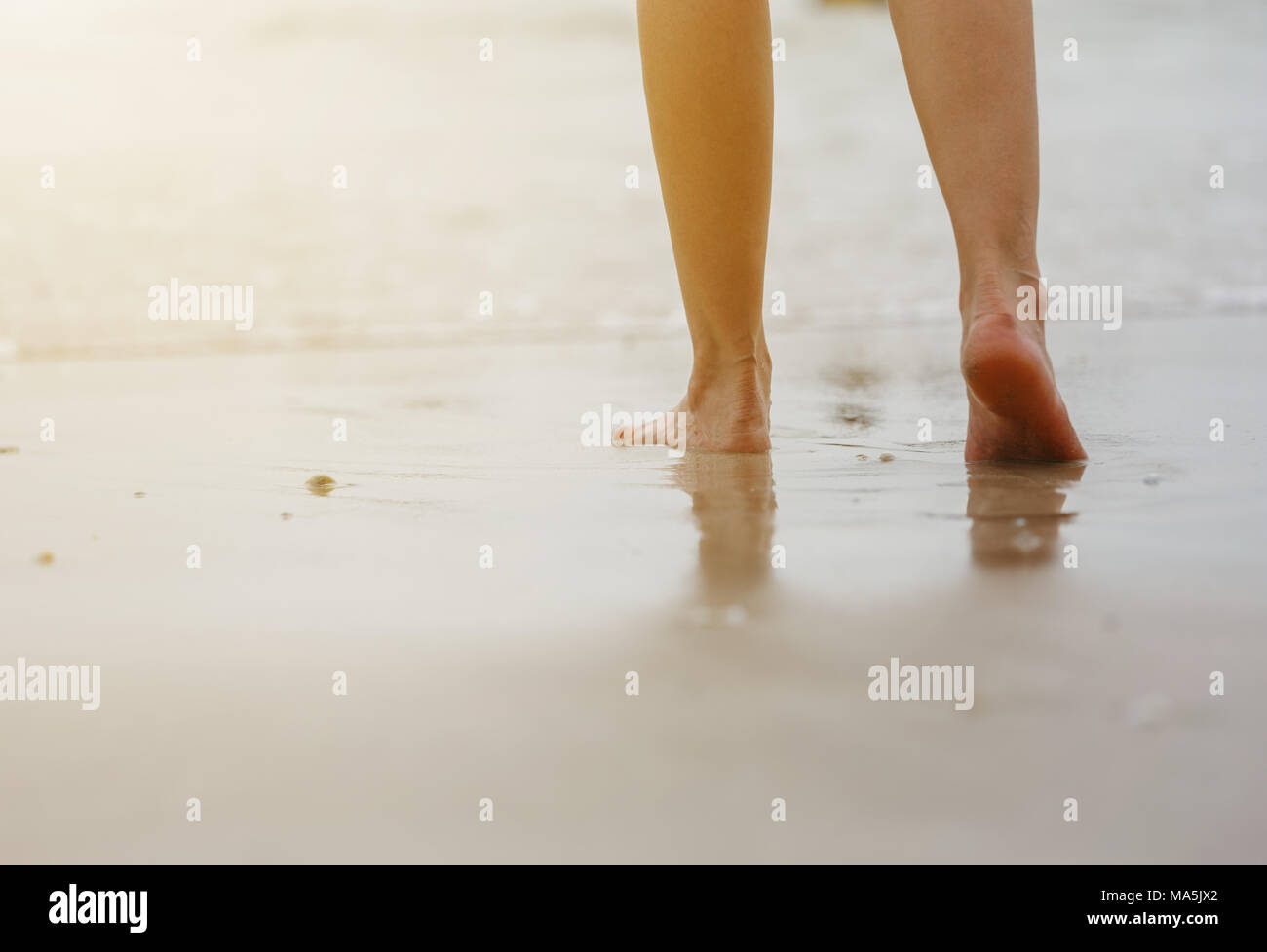 Female feet walking on golden hi-res stock photography and images - Alamy
