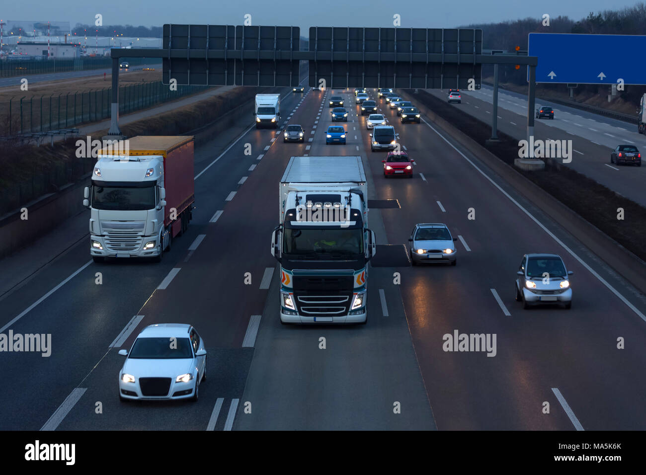 german highway traffic in dusk Stock Photo - Alamy