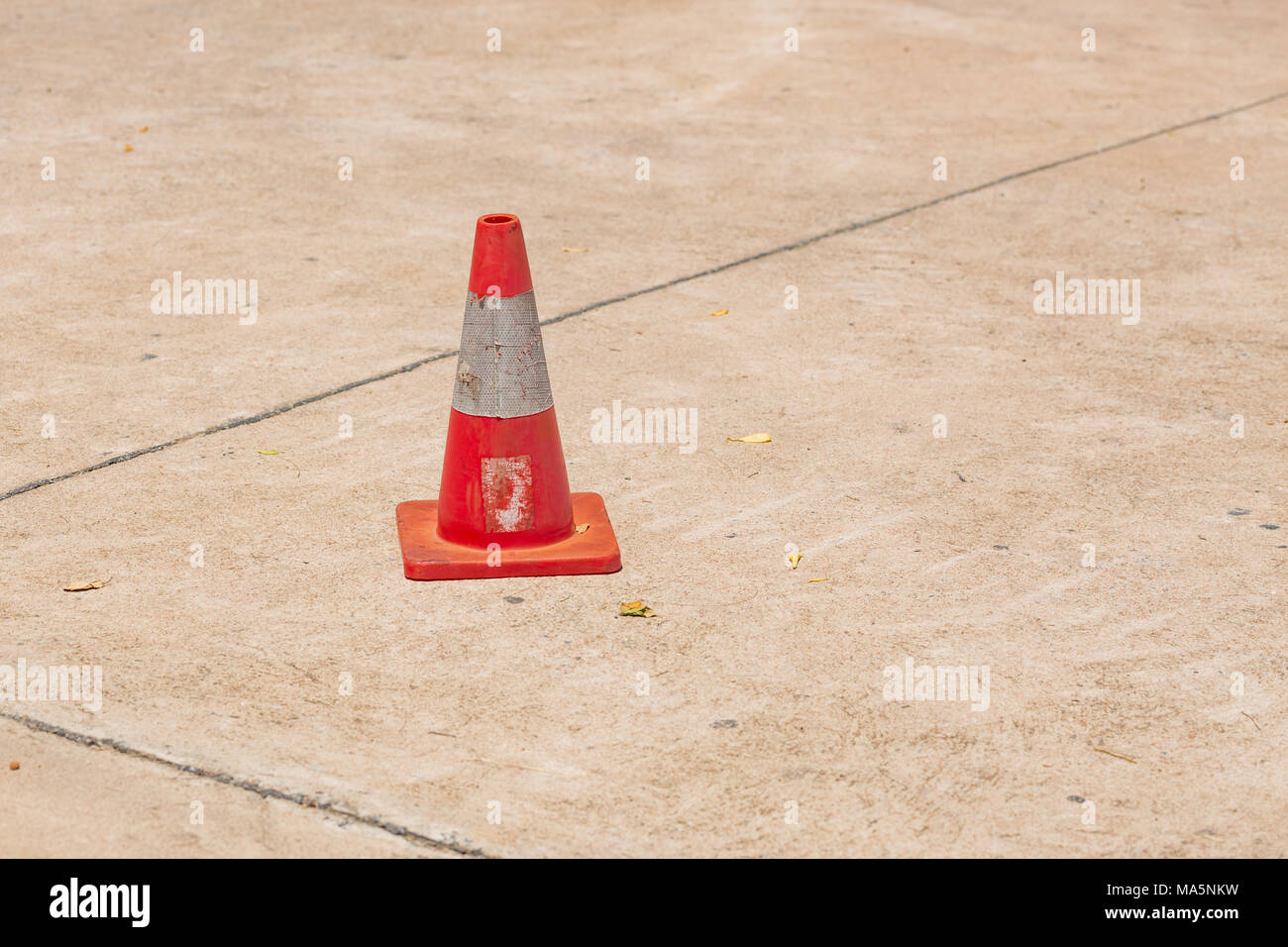 Orange road hazard cone Stock Photo - Alamy