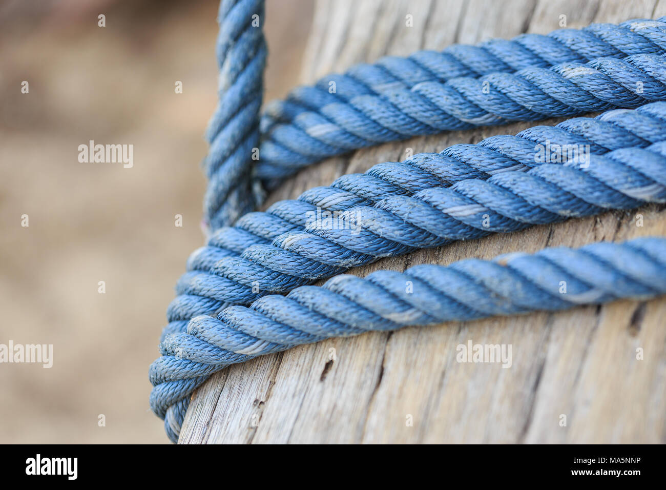 Rope wrapped around pole hi-res stock photography and images - Alamy